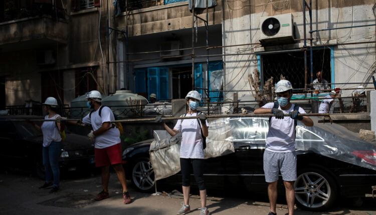 Photos: Grieving Lebanese neighbourhood struggles to rebuild after ...